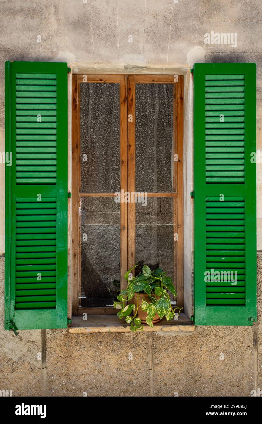 Open front door shutters hi-res stock photography and images - Alamy