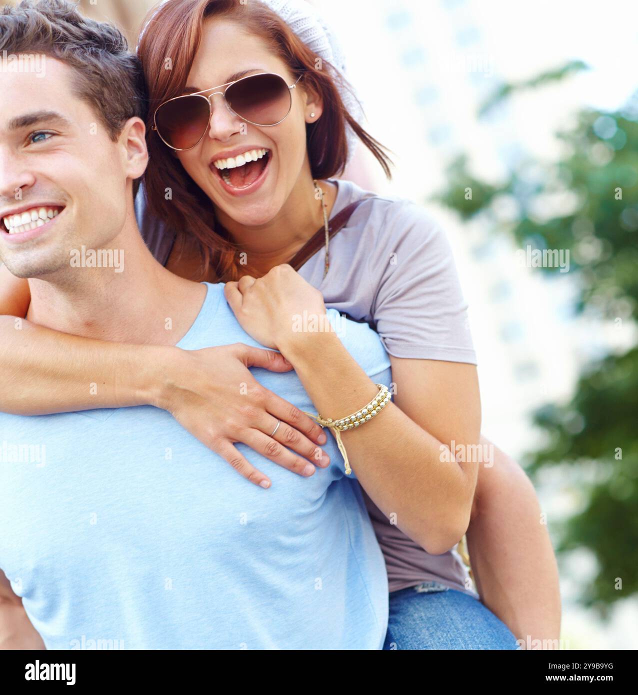 Travel, excited couple and piggyback outdoor for connection, love and ...