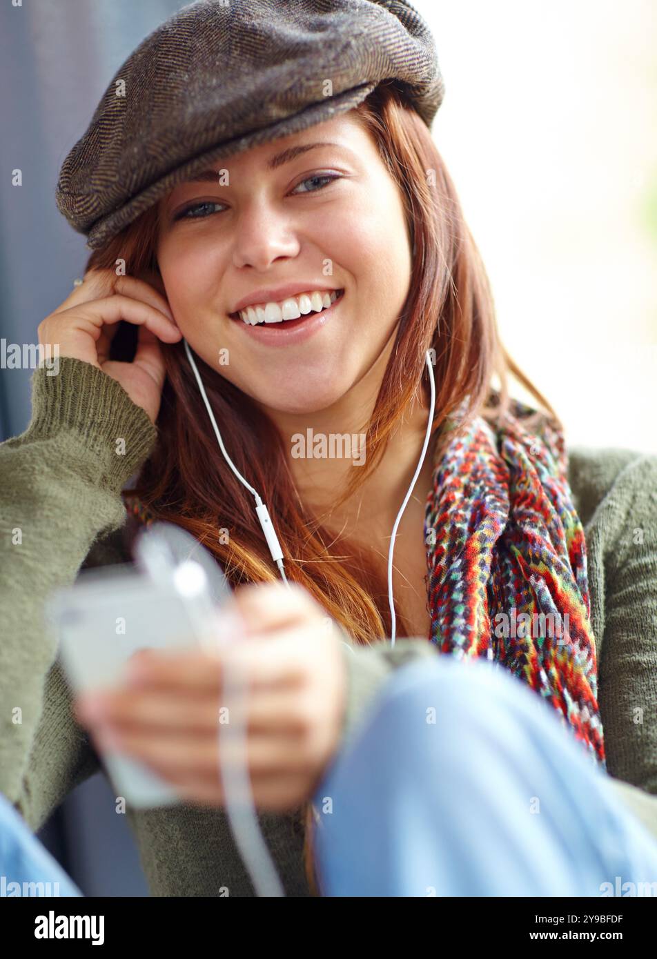 Train, travel and woman in portrait for music, audio track and smile ...