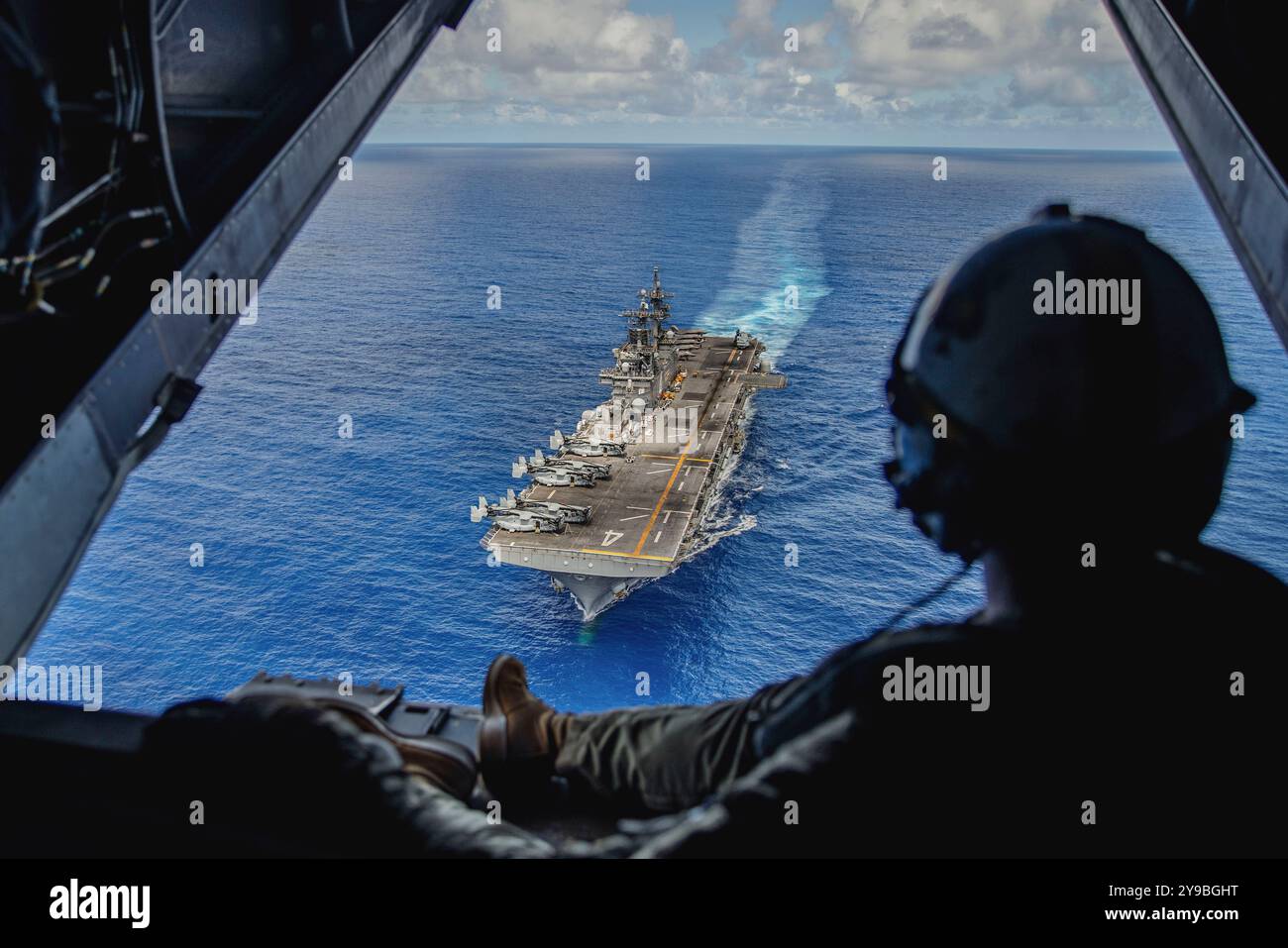U.S. Marine Corps Sgt. Mitchell Parcell, a V-22 tiltrotor crew chief ...
