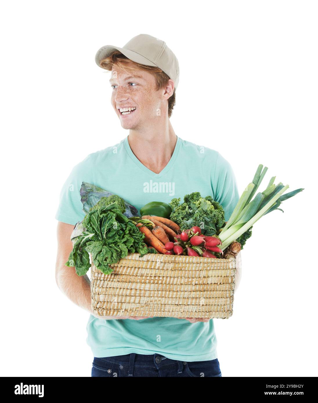 Delivery man, vegetables and basket in studio with groceries, order and ...