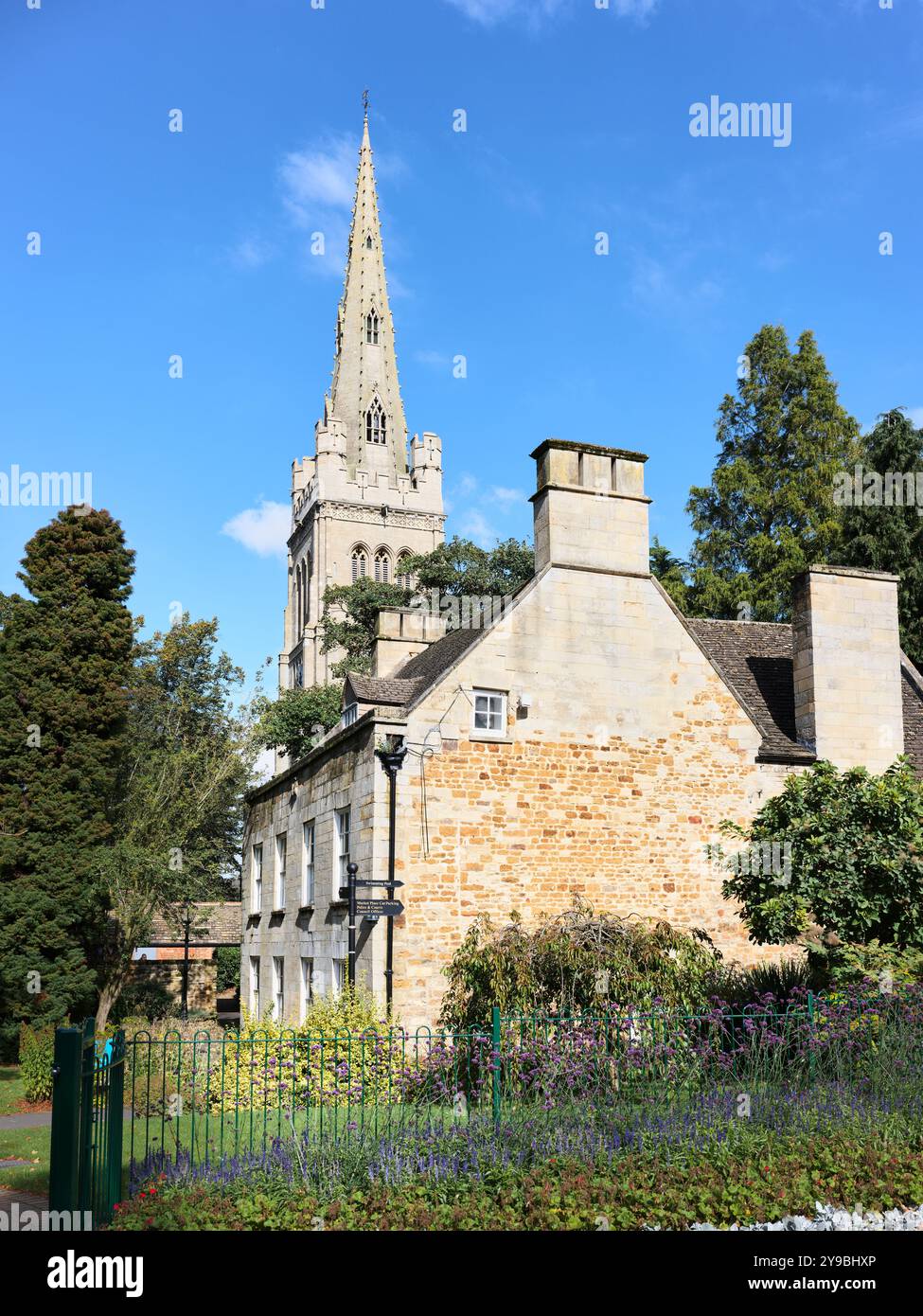 Manor House museum with the tower and spire of Saints Peter and Paul ...