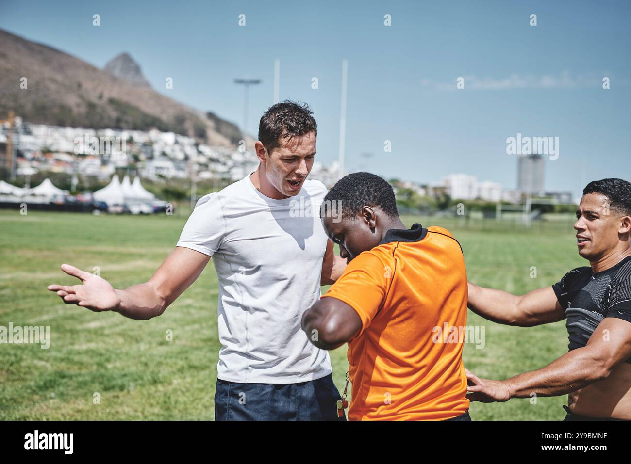 Rugby, team and referee with fighting in game on field for foul play ...