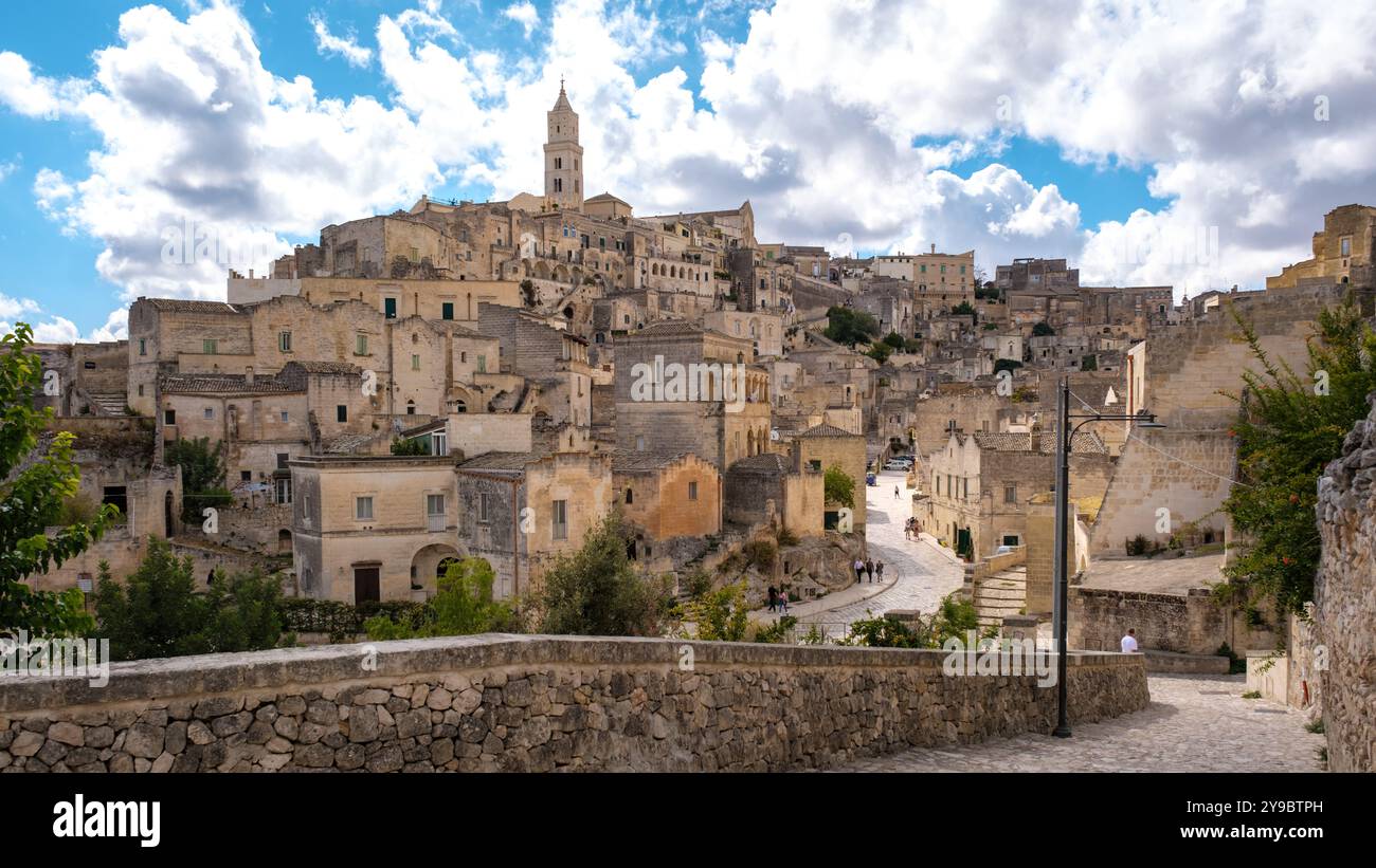 Winding through the historic streets of Matera Italy, visitors marvel ...