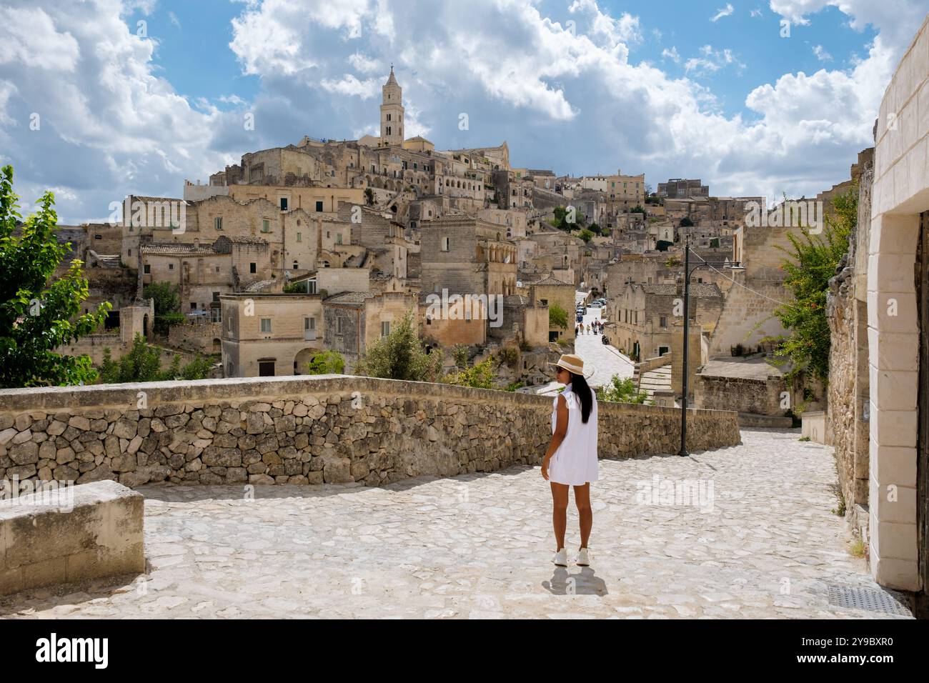 A traveler admires the stunning landscape of Matera, Puglia, Italy ...