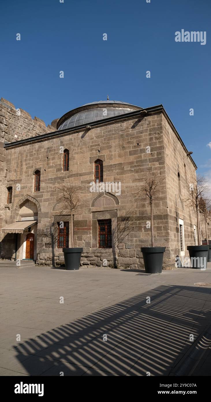 Historic stone building with arched entrance Stock Photo - Alamy