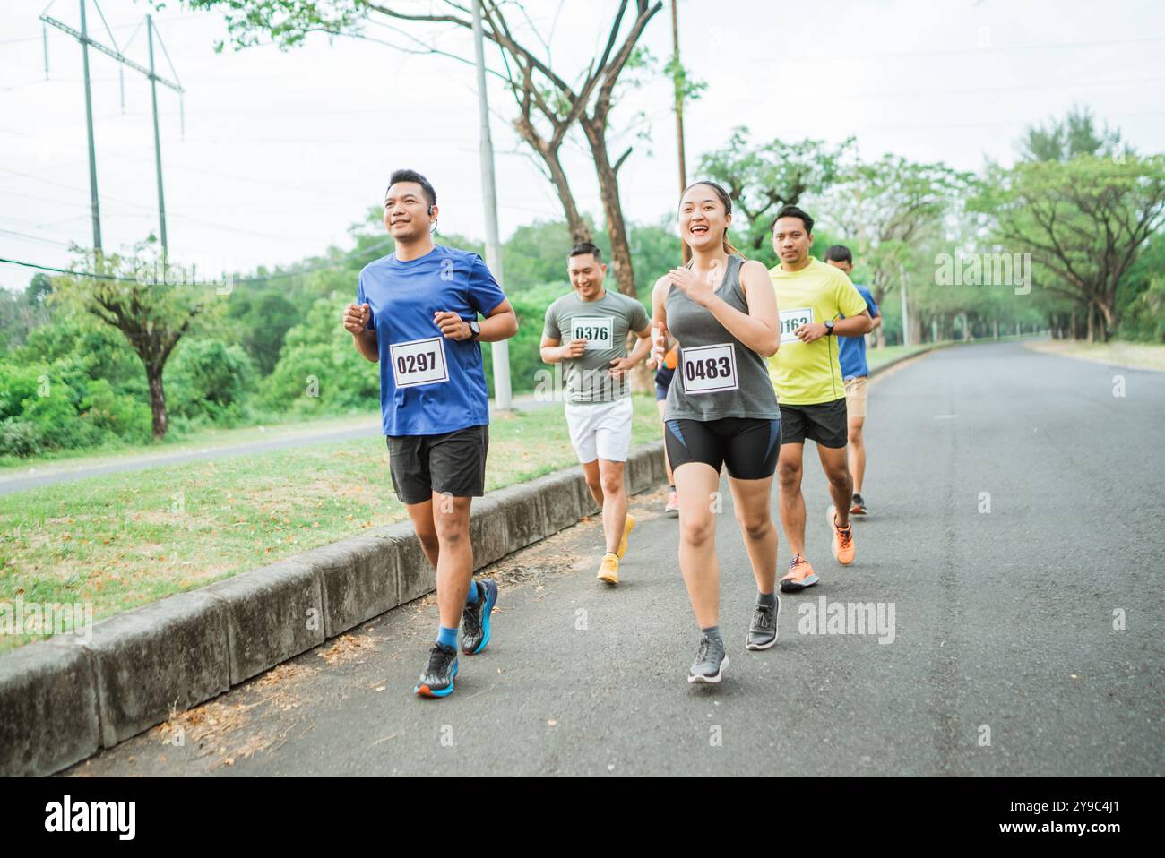 asian marathon athlete running nature track Stock Photo - Alamy