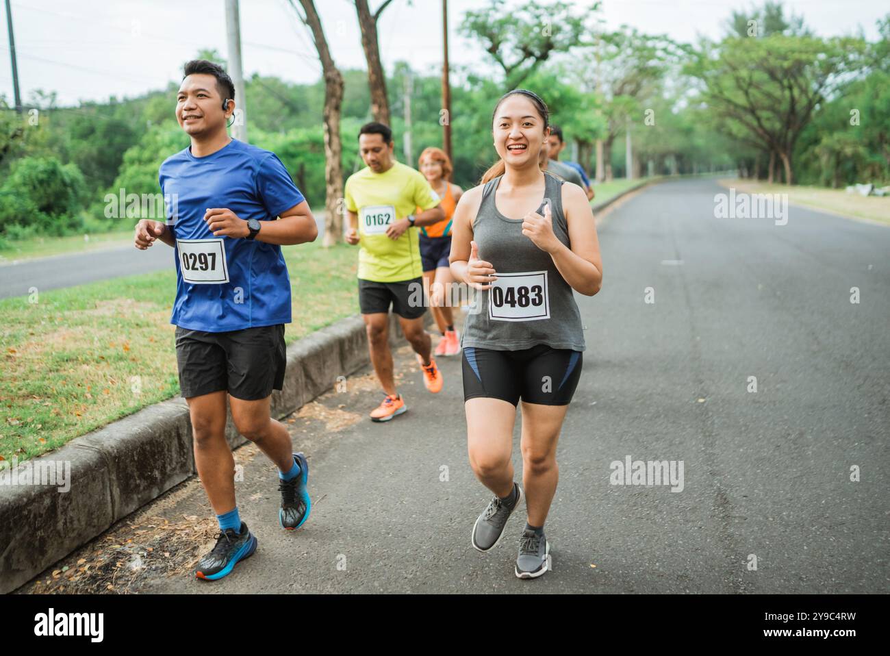 asian athlete activity joining marathon competition Stock Photo - Alamy