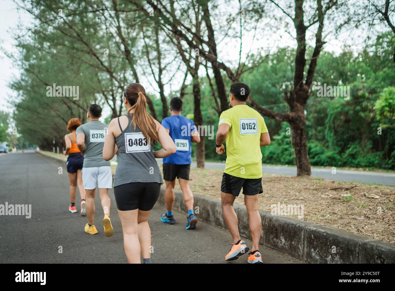 back view runner participating marathon competition Stock Photo - Alamy