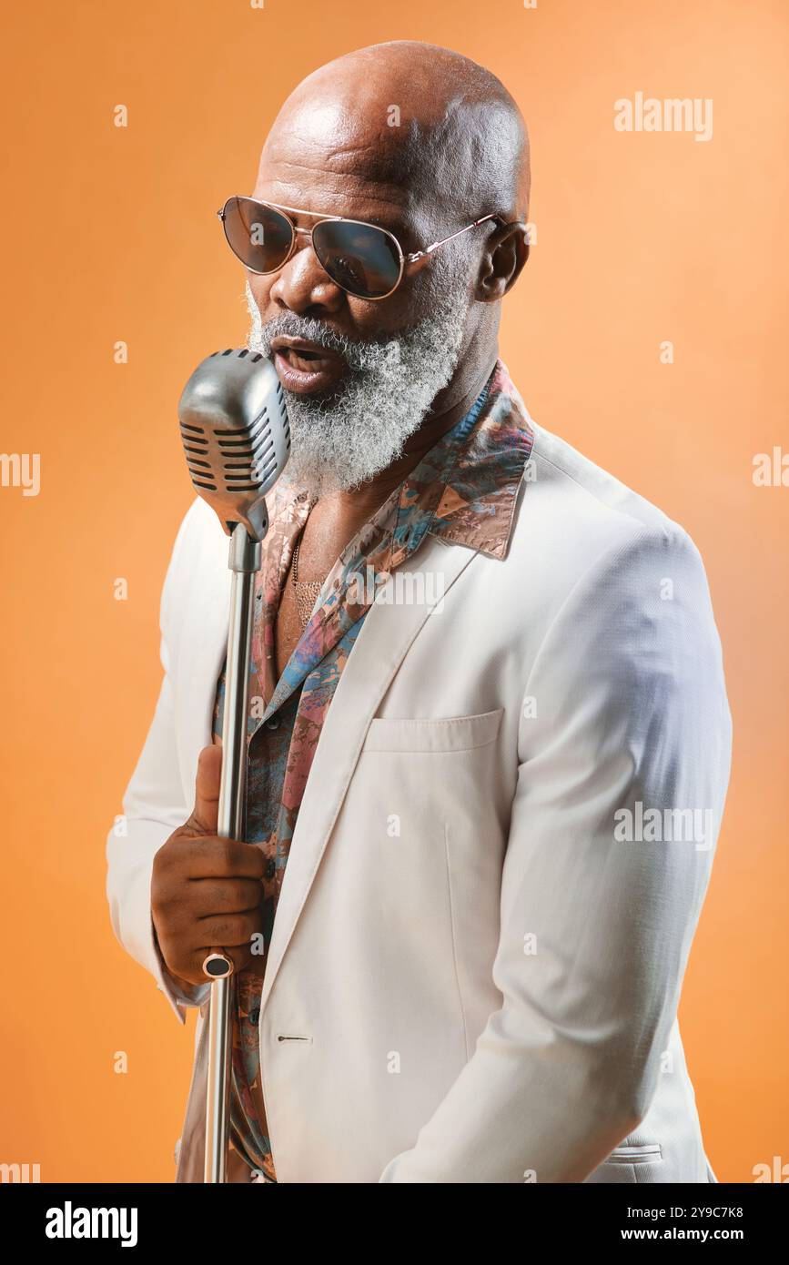 Singer, senior and black man with soul, jazz and old school music with ...