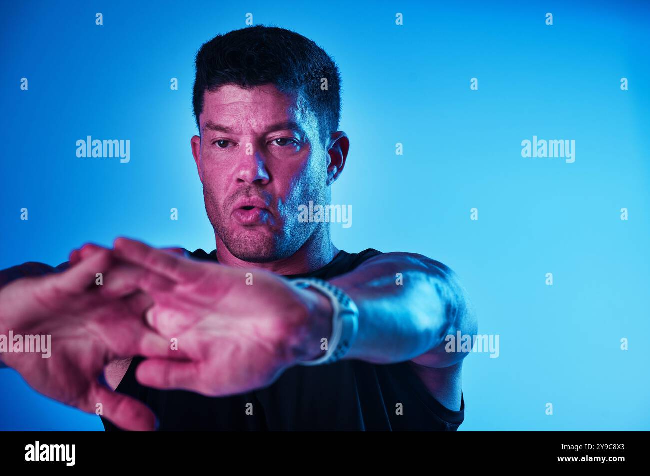 Man, hands and stretching in studio for fitness, physical activity and ...