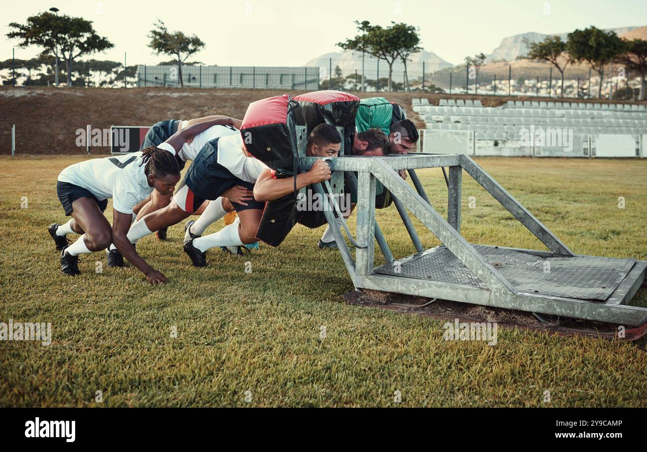 Equipment, rugby and training with team of people outdoor on field ...