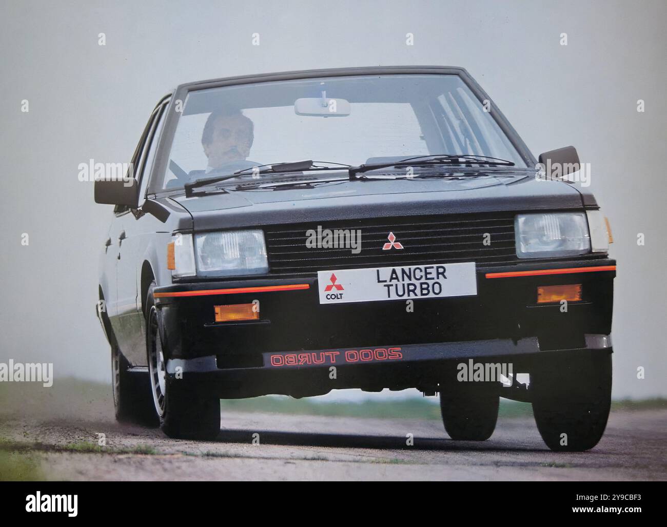 Lancer Turbo 1981 - Vintage press car advertising Stock Photo - Alamy