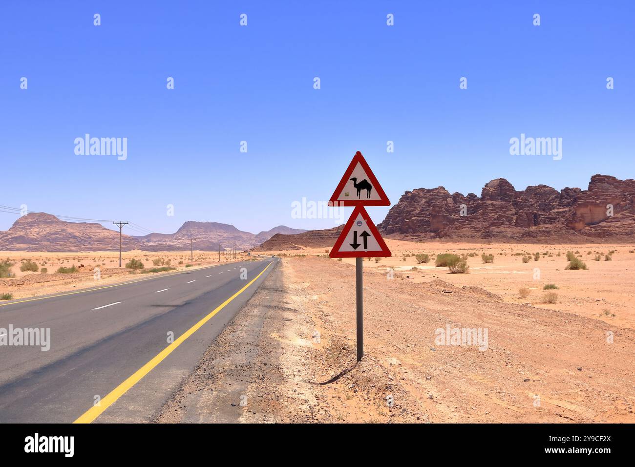 Funny road sign warning crossing camels in the Wadi Rum desert, Jordan ...