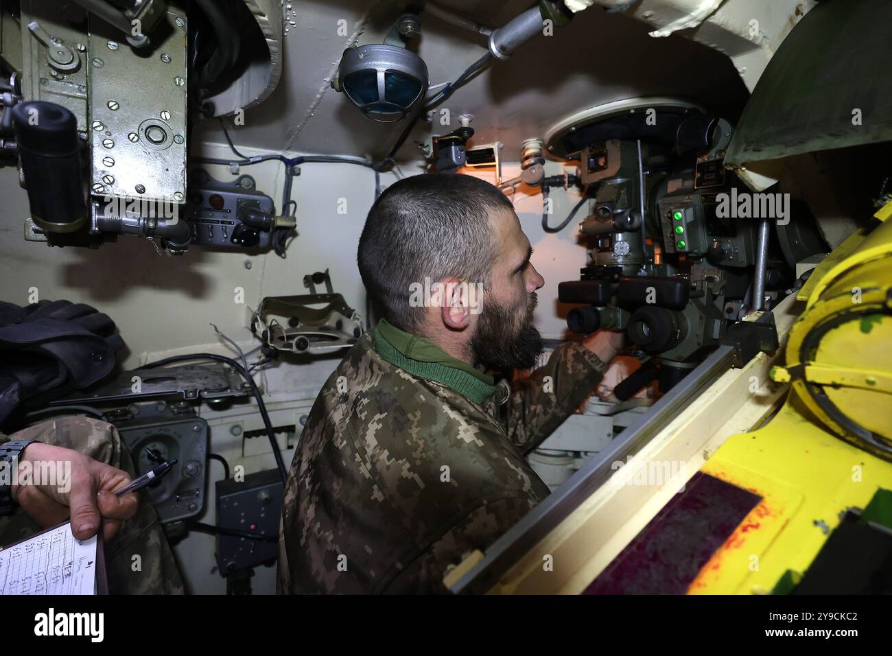 KHARKIV REGION, UKRAINE - OCTOBER 9, 2024 - A soldier of Ukraine’s ...