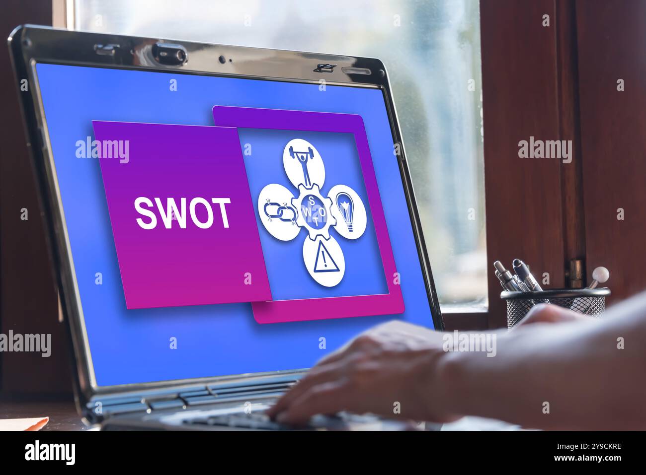 Laptop screen displaying a swot concept Stock Photo - Alamy