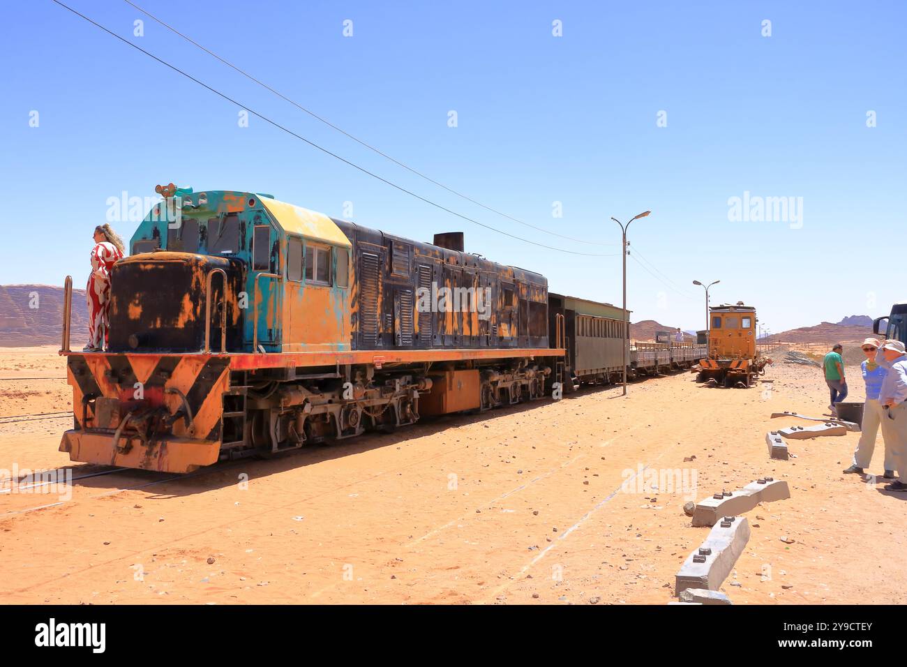 Wadi Rum in Jordan - May 15 2024: people visit the old Locomotive train ...