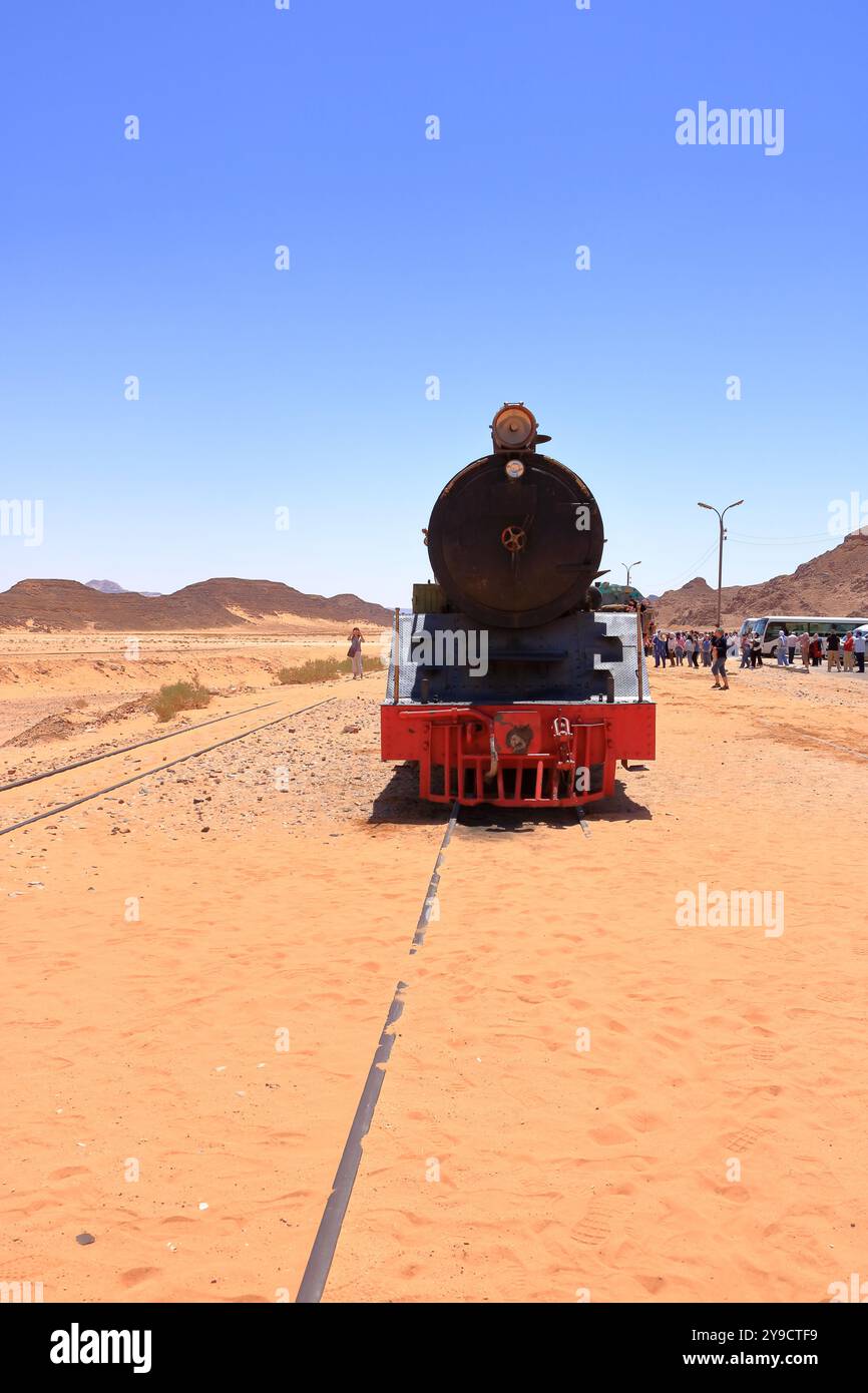 Wadi Rum in Jordan - May 15 2024: people visit the old Locomotive train ...