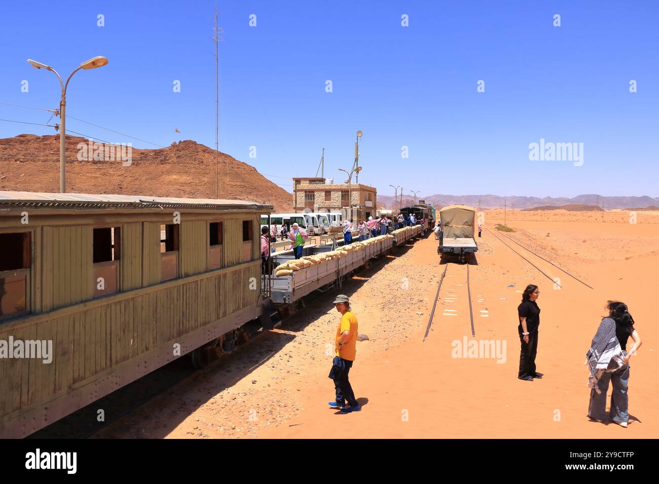 Wadi Rum in Jordan - May 15 2024: people visit the old Locomotive train ...