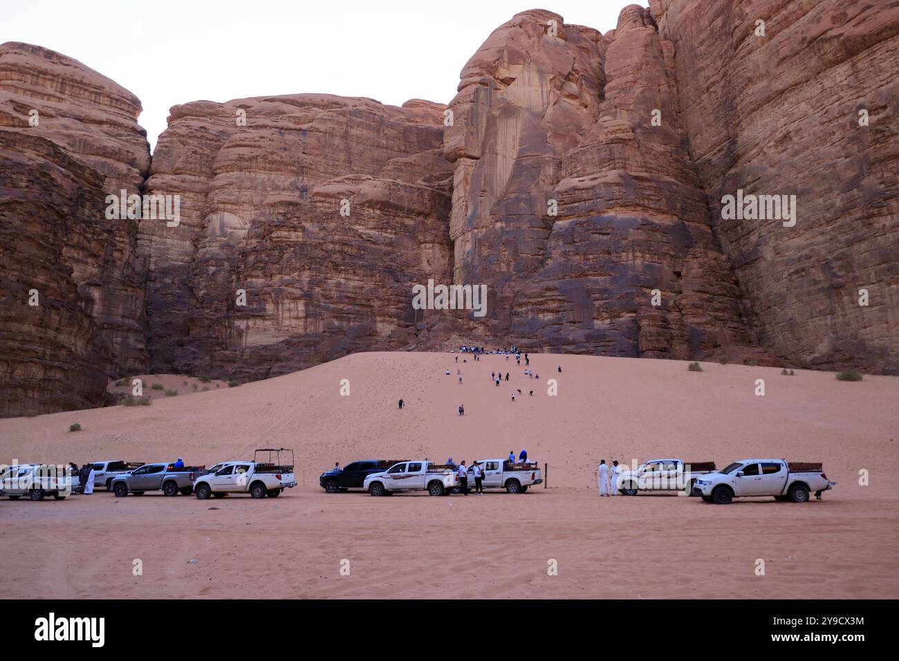 Wadi Rum in Jordan - May 15 2024: people sandboarding on the red sand ...