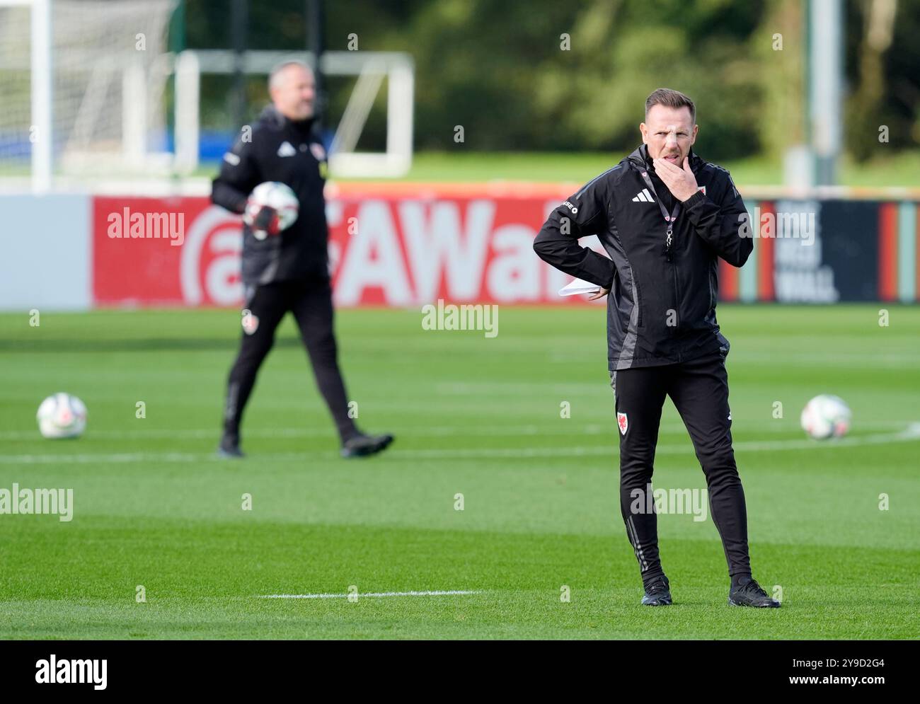 Wales manager Craig Bellamy (right) during a training session at the ...