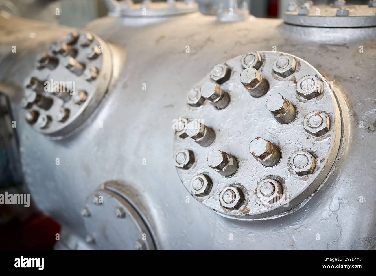 Two metal steampunk covers or hatches plate of compressor valves close ...