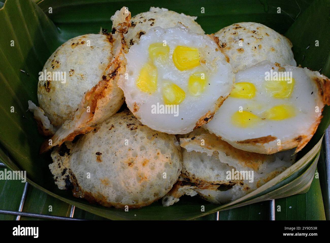 Khanom Krok pancakes with corn fillings, a popular Thai street food ...