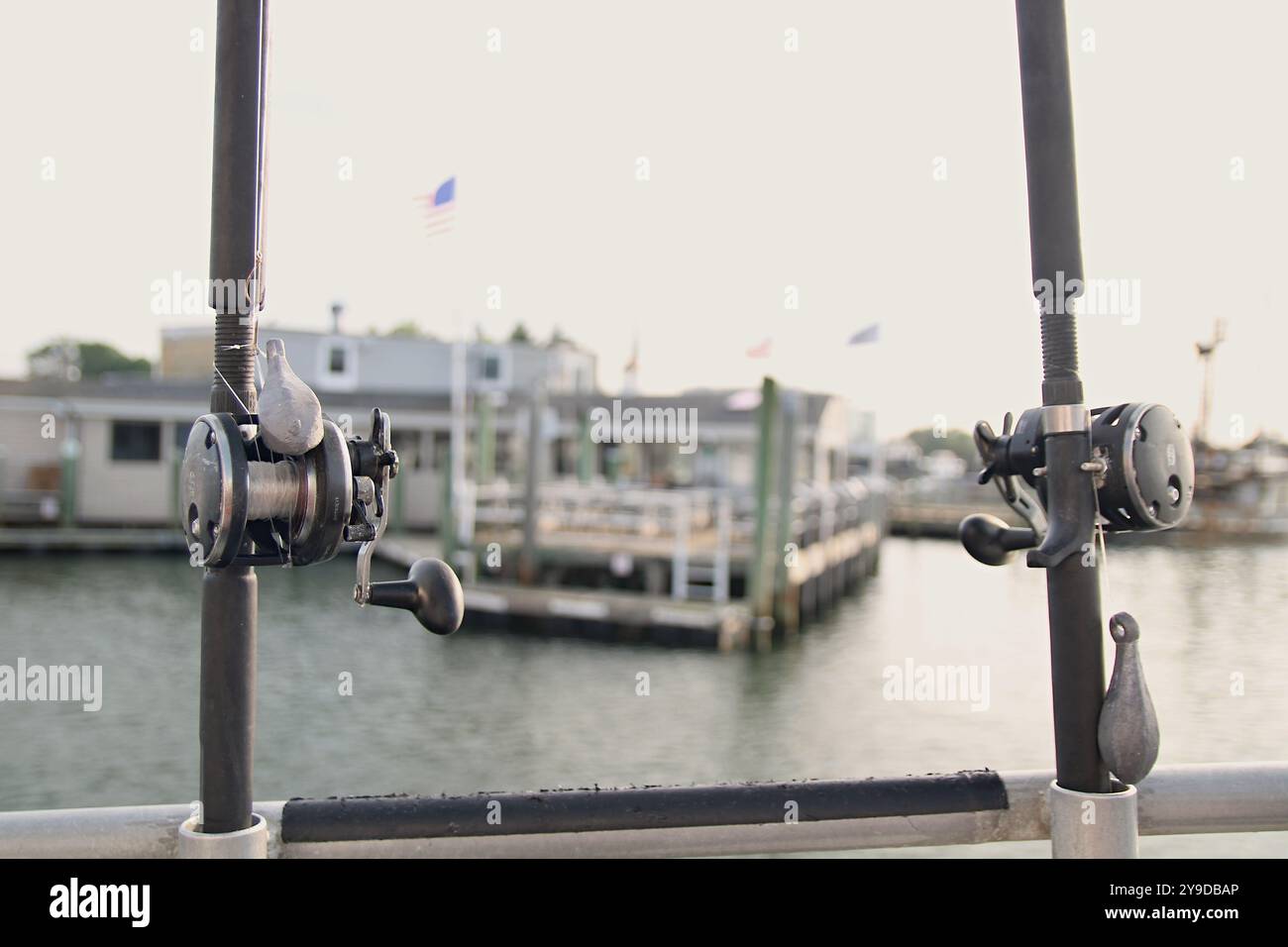 Fishing Poles On The Rail As The Charter Boat Leaves The Marina At ...