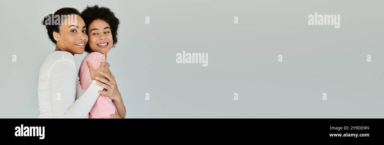 Two friends embrace tightly, smiling warmly, showcasing their joyful ...