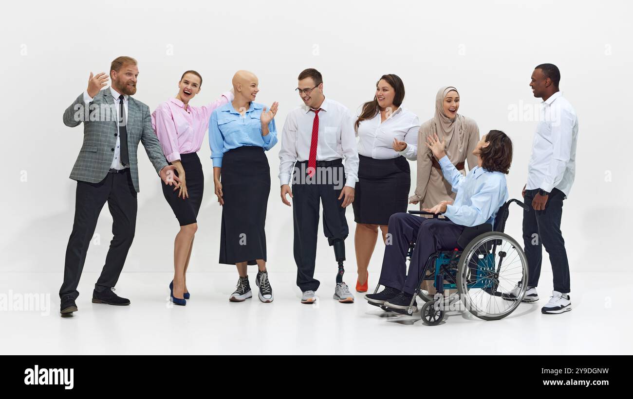 Lively group of diverse people, colleagues engage in animated ...