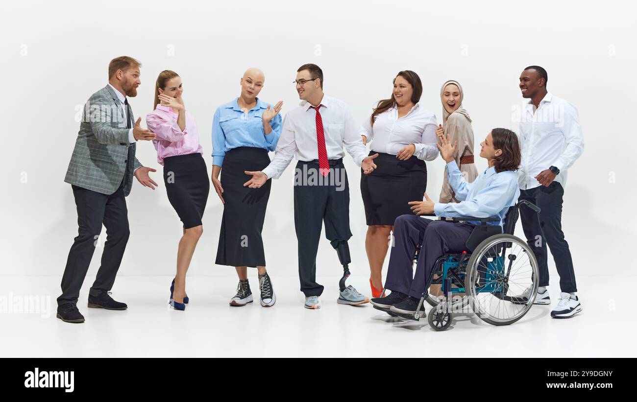 Lively group of diverse people, colleagues engage in animated ...