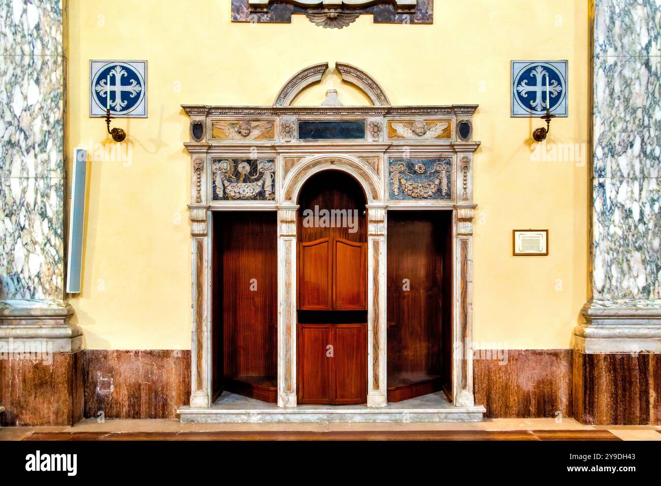 This ornate confessional booth is located inside the Duomo of Livorno ...