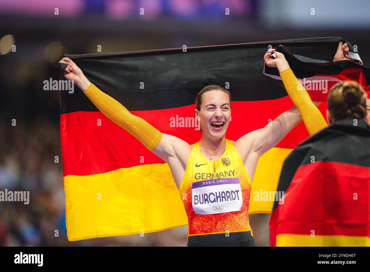 Alexandra Burghardt celebrating with her country's flag in the 4X100 ...