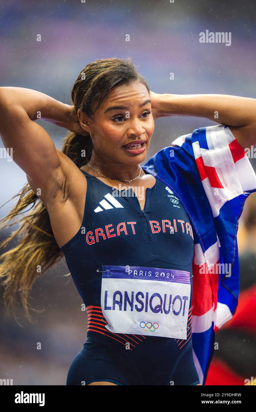 Imani-Lara Lansiquot participating in the 4X100 meters relay at the ...