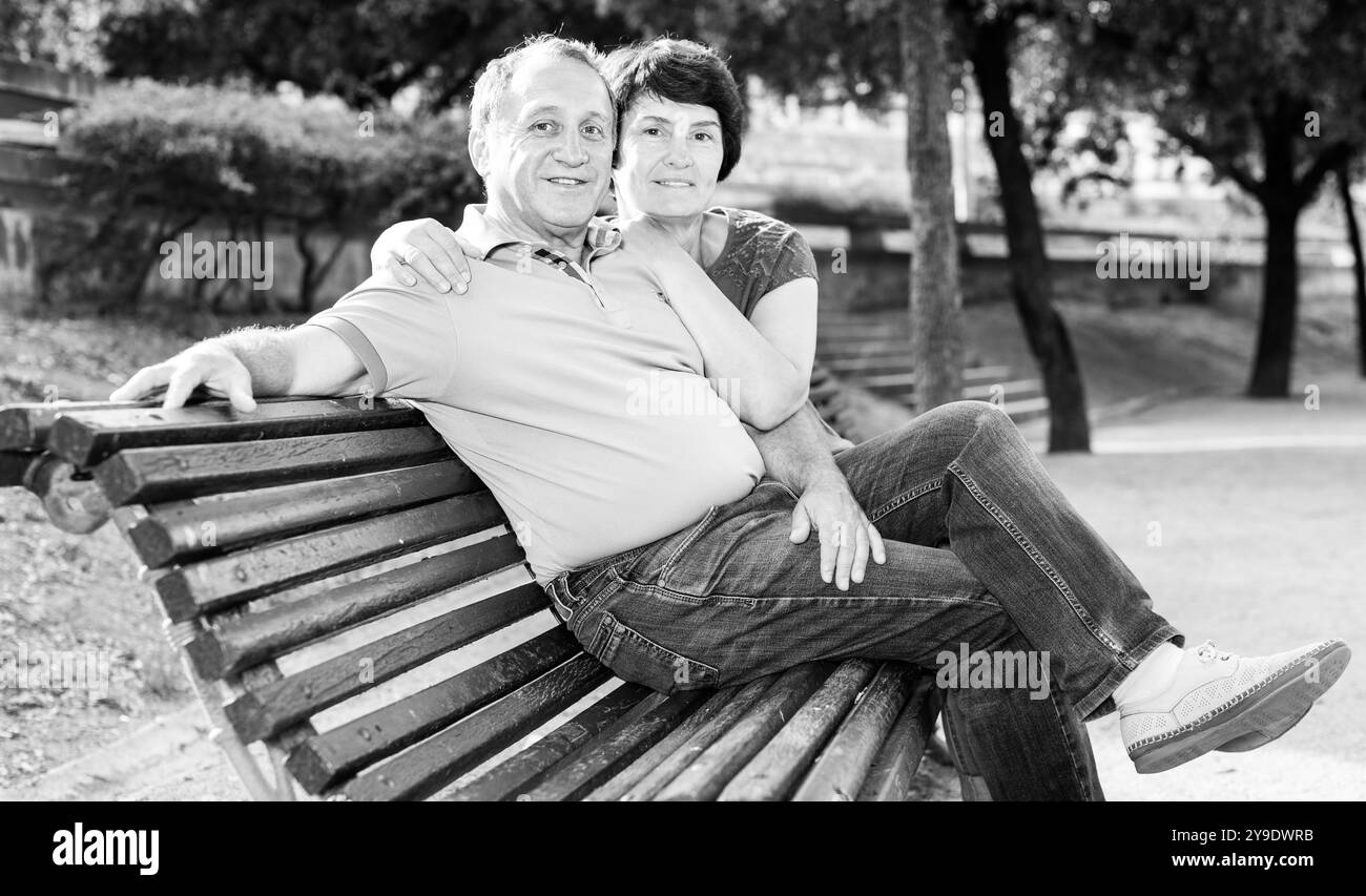 Sitting on bench beautiful Black and White Stock Photos & Images - Alamy