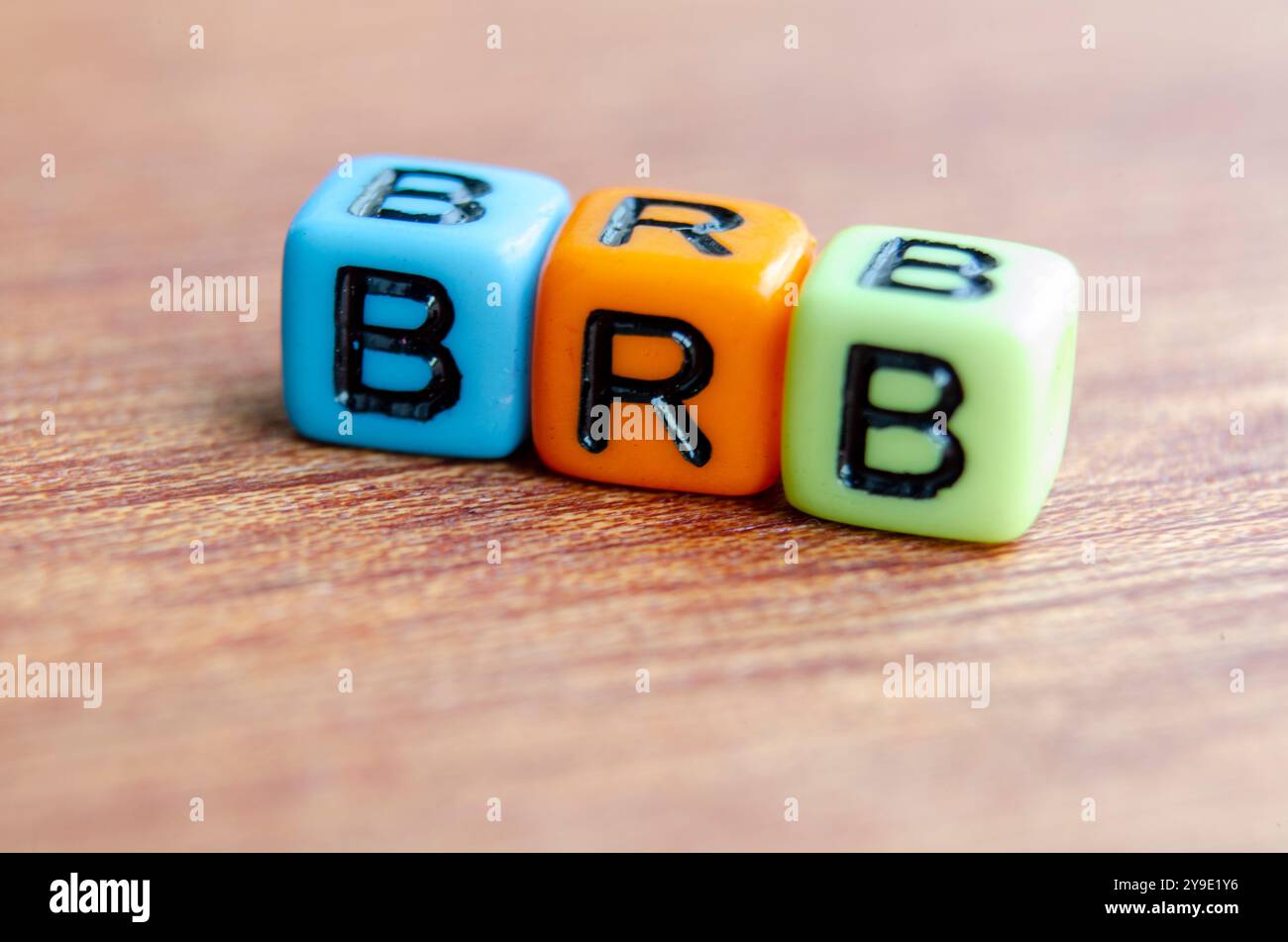 BRB text represent Be Right Back on wooden. Taking a break concept ...