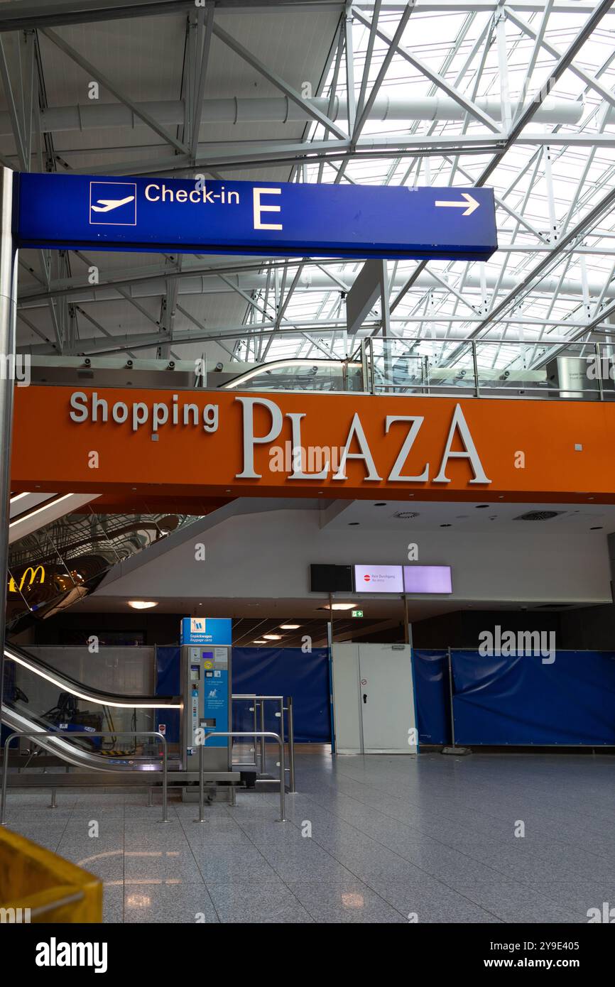 Frankfurt Airport, Germany - February 19, 2024: travelers are guided by ...