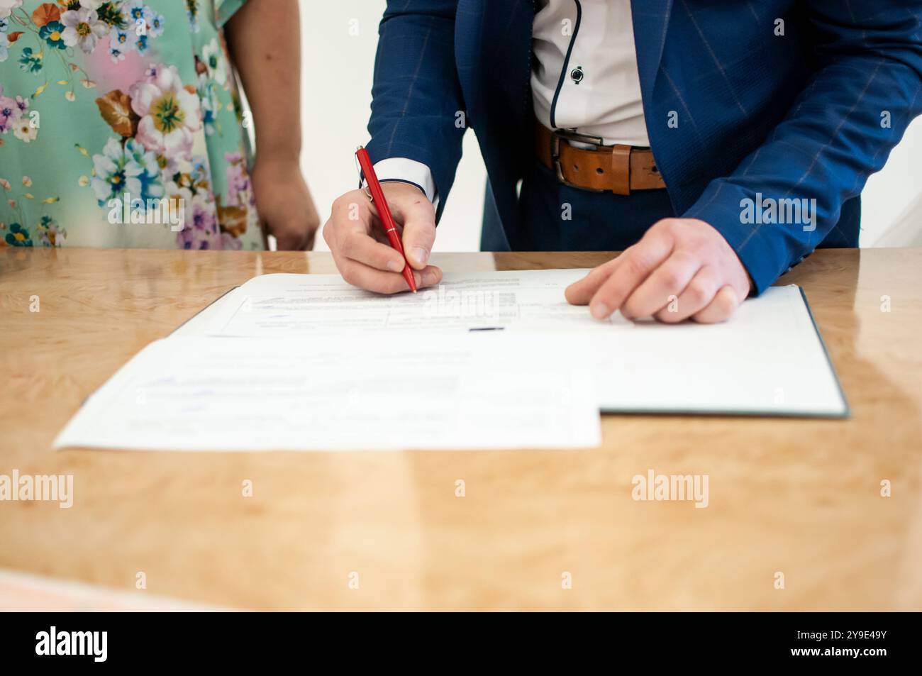 Elegant Signing Ceremony with Detailed Document Engagement Stock Photo ...