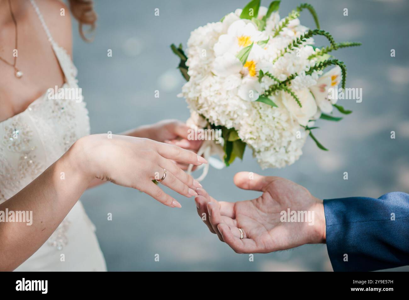 Romantic Wedding Moment with Bridal Bouquet and Hands Intertwined Stock ...