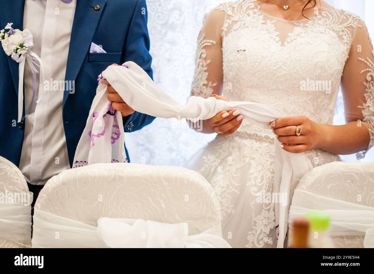 Elegant Wedding Traditions: The Knot Tying Ceremony Stock Photo - Alamy