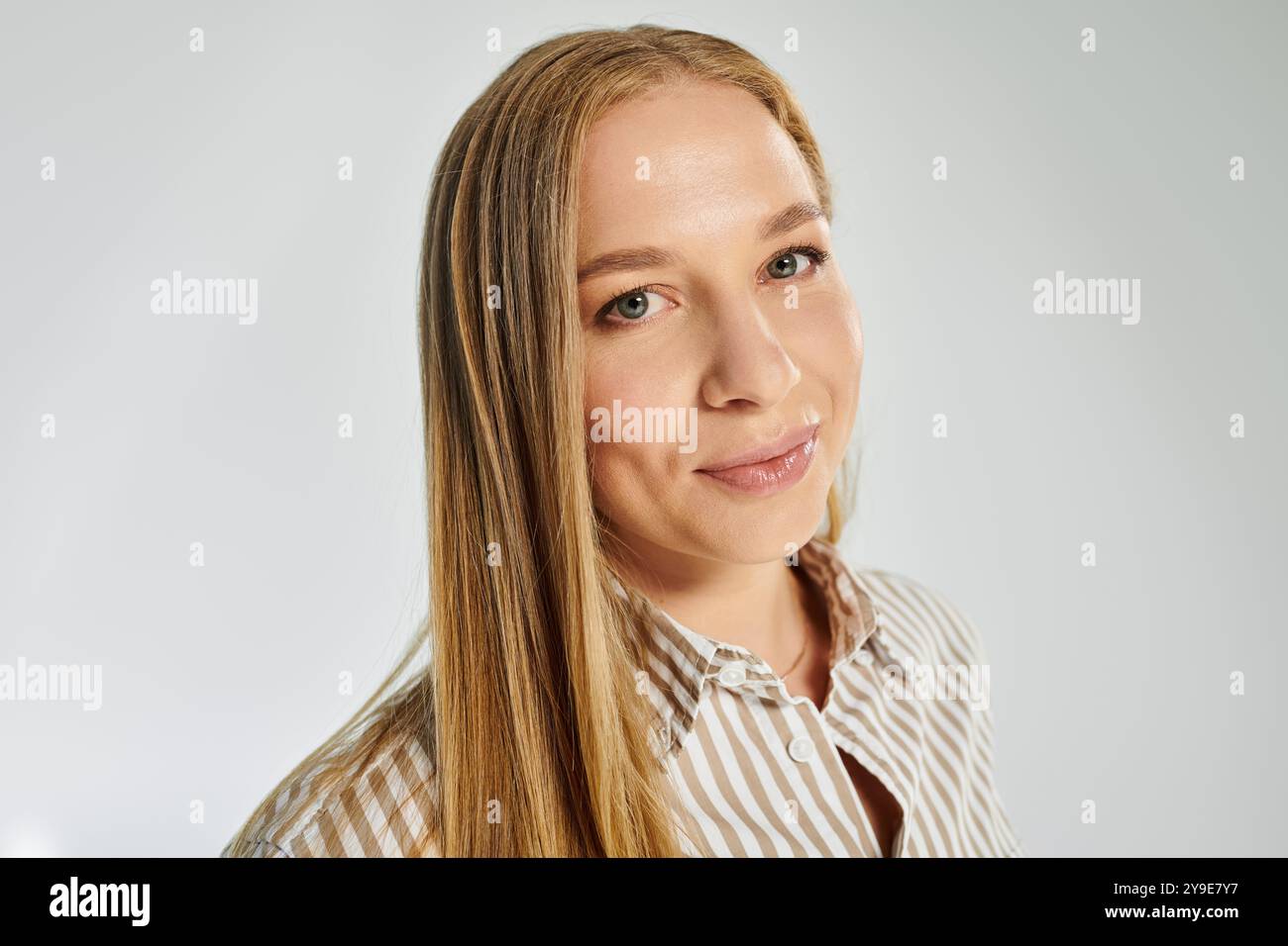 Woman flowing long hair stands hi-res stock photography and images - Alamy