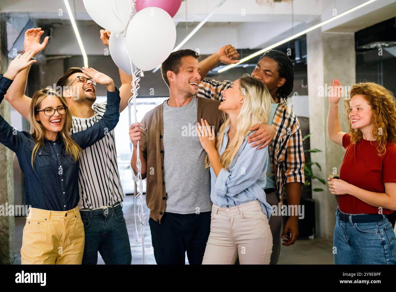 Happy diverse business team celebrating success and having fun all together in office Stock ...