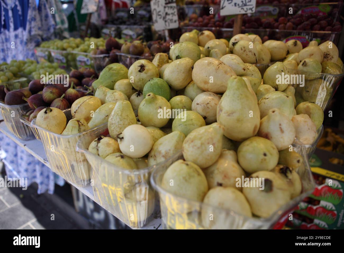 Fresh produce, guava, figs & grapes for sale on a market stall in the ...