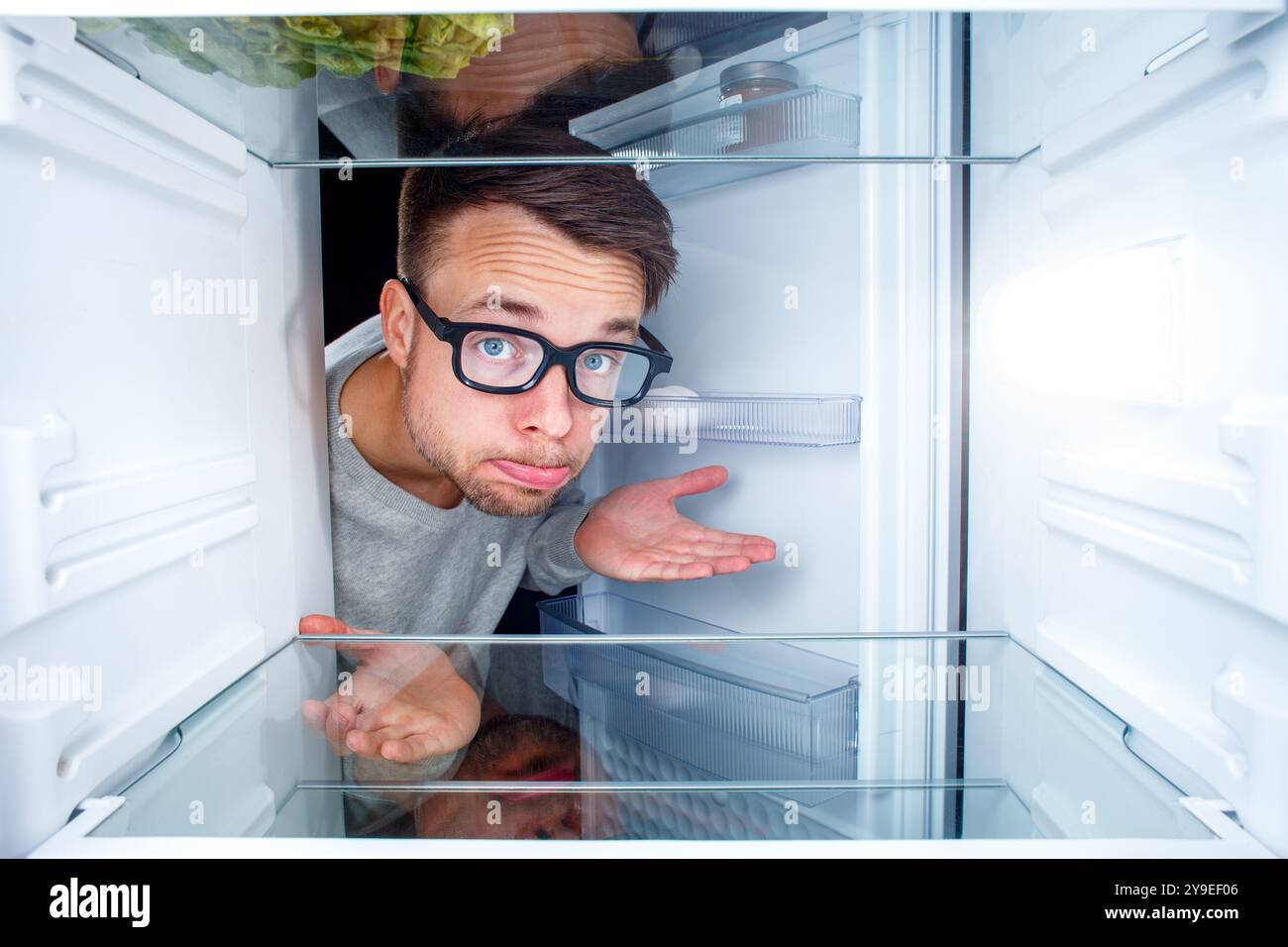 Man Disappointed by Empty Fridge Stock Photo - Alamy