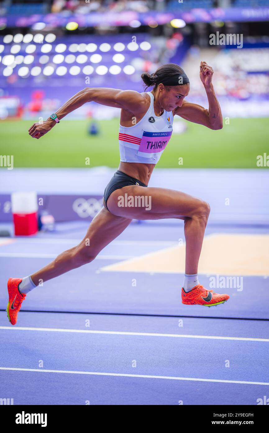 Nafissatou Thiam participating in the long jump at the Paris 2024 ...