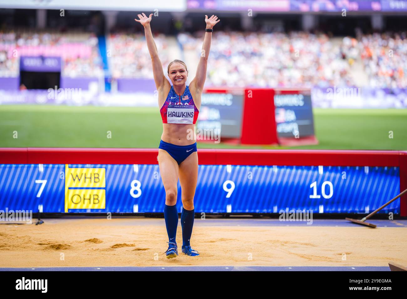 Chari Hawkins participating in the long jump at the Paris 2024 Olympic ...