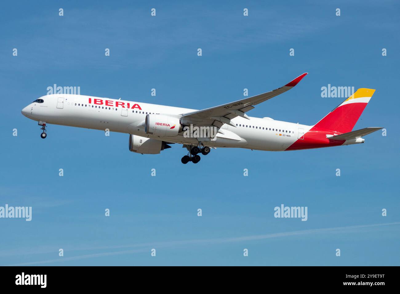 Long-haul airliner Airbus A350 of the Iberia airline landing at Madrid Barajas airport Stock ...