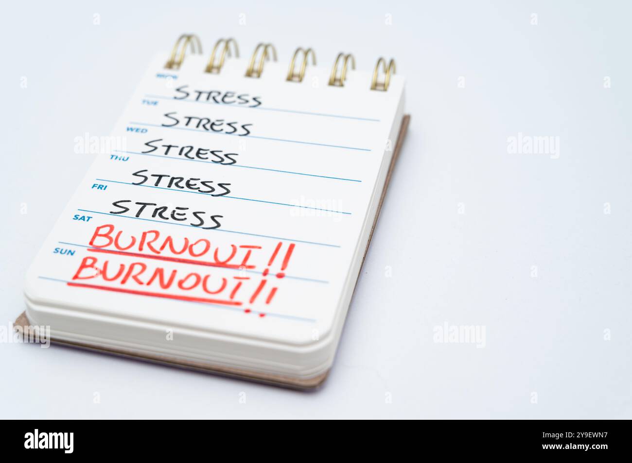Calendar with days of the week, and the words stress and burnout ...