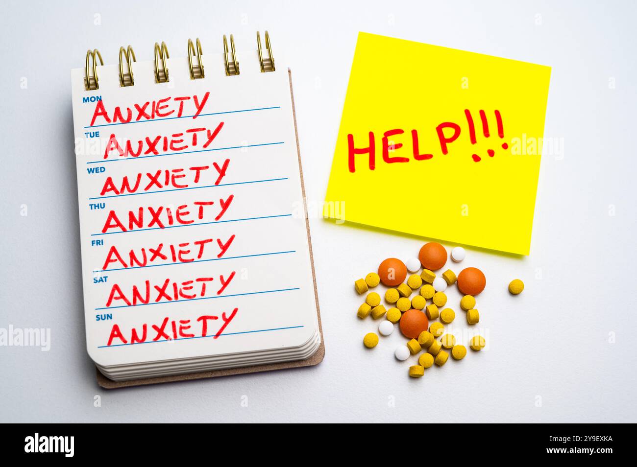 Weekly planner, the word anxiety on each day, medicines next to it, and ...