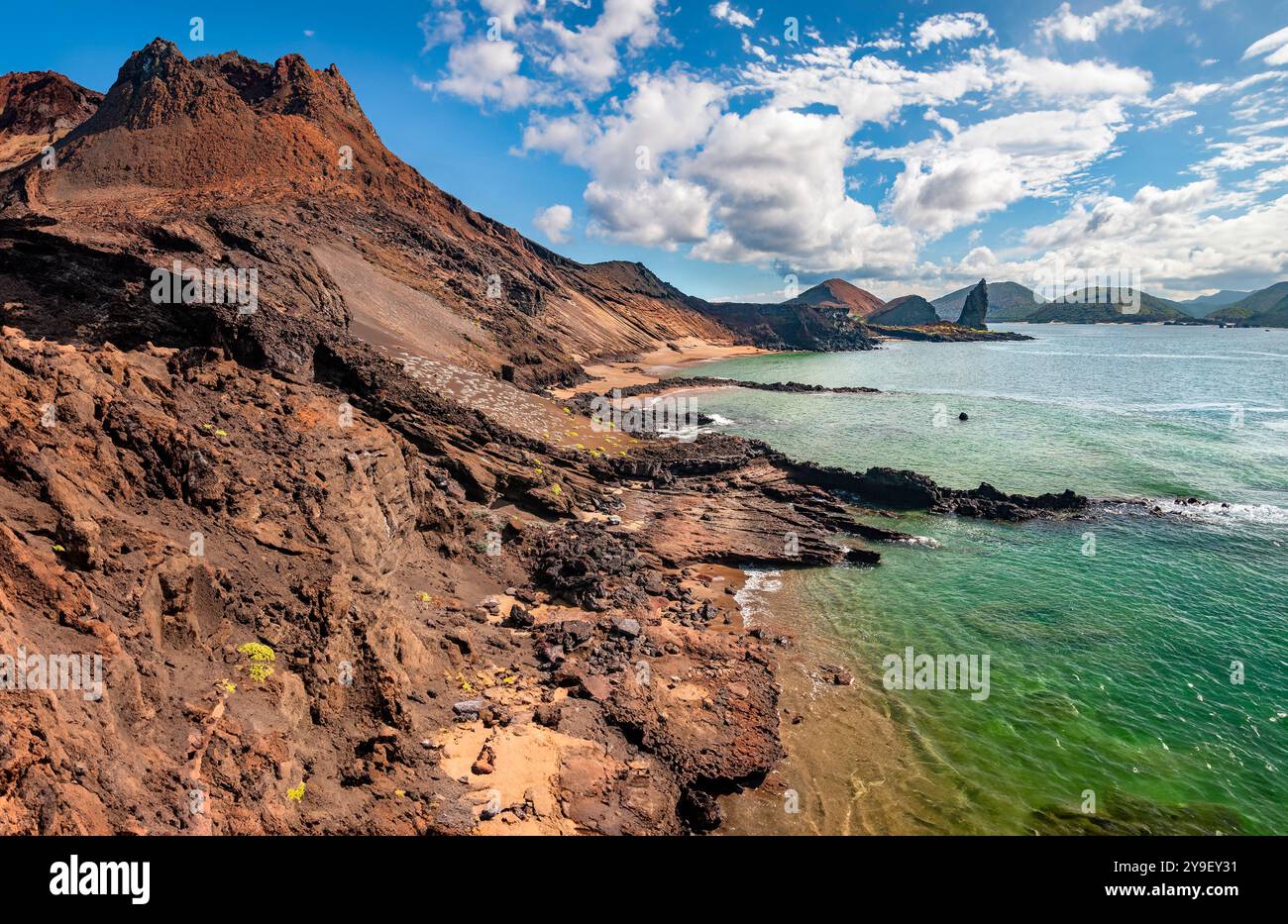 Pinnacle Rock and the volcanic landscape of the island of Bartolome in ...